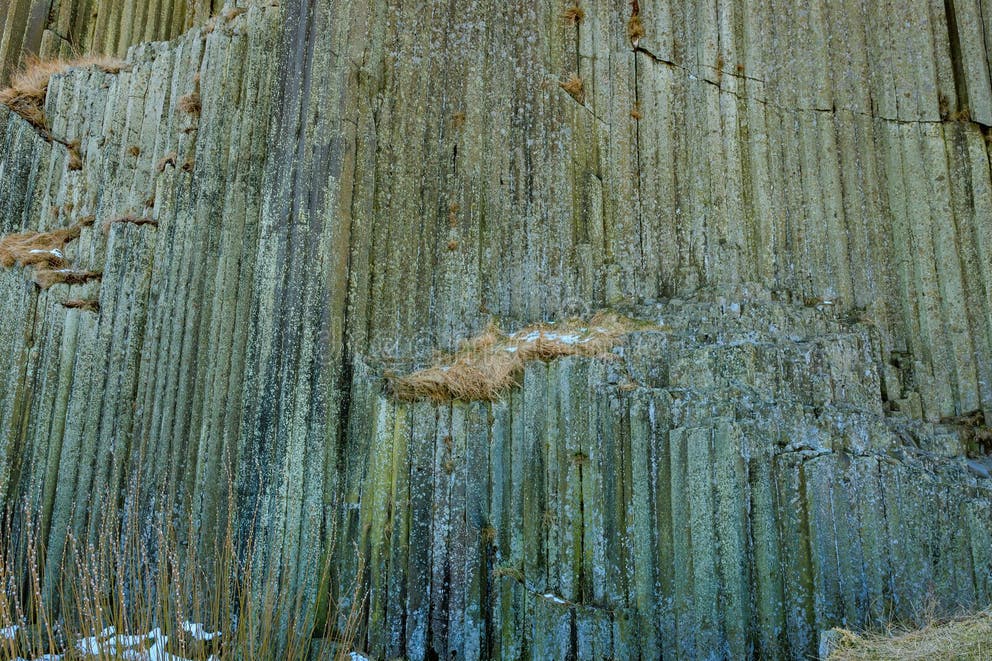 Basalt Columns in Nature: Vertical Rock Formations with Moss and Snow ...