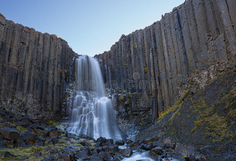 Basalt Columns Waterfall in Studlagil Canyon, Iceland Stock Image ... Basalt Columns Waterfall in Studlagil Canyon, Iceland Stock Image ...