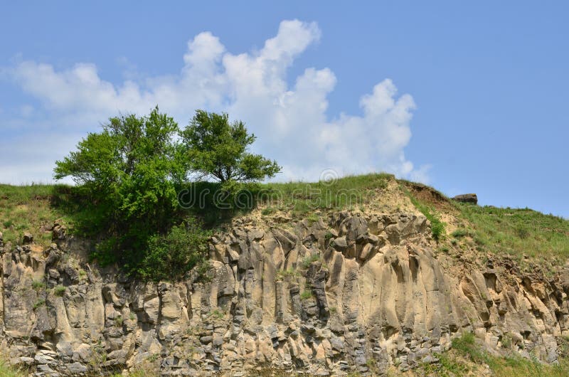 Basalt landscape stock image. Image of minerals, trees - 73910433