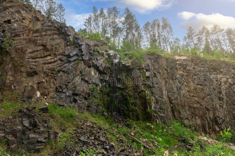 Basalt Pillars in a Quarry. Natural Basalt Rock Columns Closeup Texture ...