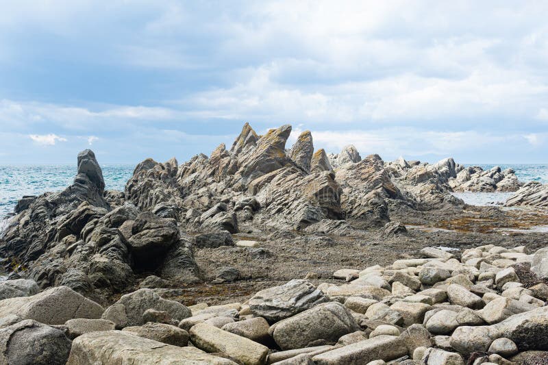 Basalt Rocks on the Sea Coast, Cape Stolbchaty on Kunashir Island Stock ...