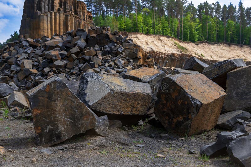 Basalt Stones in a Quarry. Columnar Basalt Quarry in Summer Stock Image ...