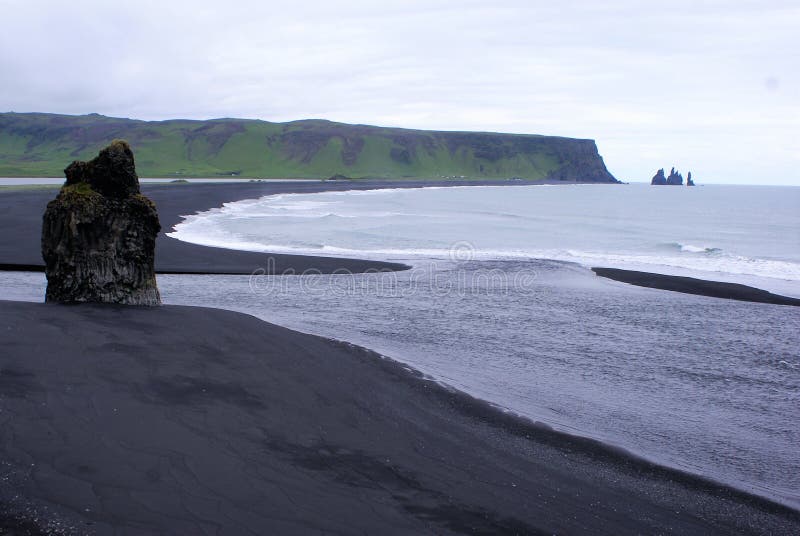 Basalt Tower on Black Beach Stock Photo - Image of cliff, mountains ...