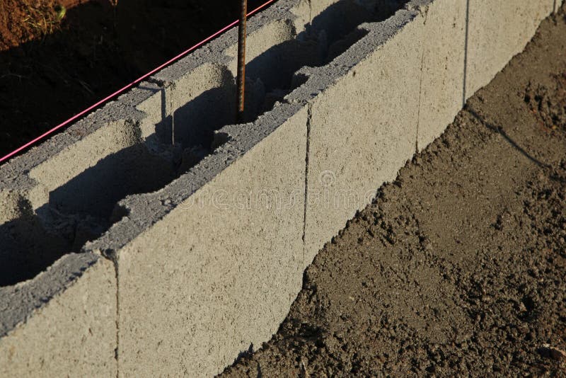 Base of a Concrete Block Wall Stock Image - Image of dwelling, blocks ...