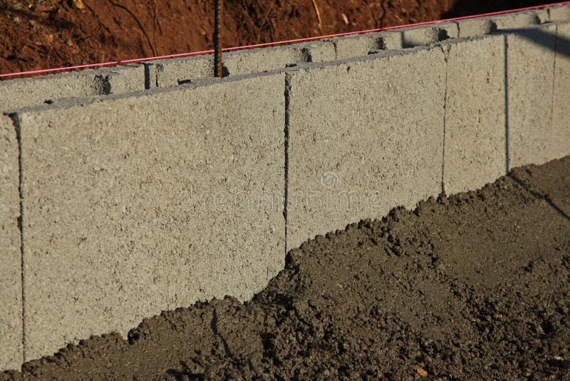 Base of a Concrete Block Wall Stock Image - Image of dwelling, blocks ...