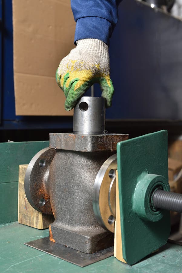 The Base for the Valve is Installed and Clamped in a Vice for Assembly ...