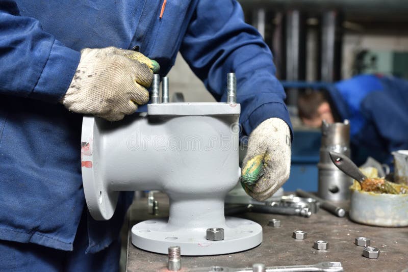 The Base for the Valve is Mounted on an Iron Table for Assembly at the ...