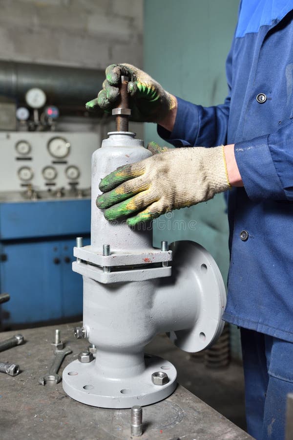 The Base for the Valve is Mounted on an Iron Table for Assembly at the ...