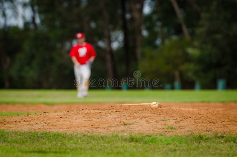 Baseball Ball Lying on the Diamond Next To the Pitching Rubber on the ...
