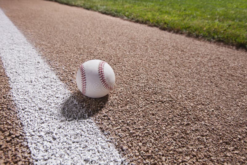 Baseball on a Base Path Under Lights at Night Stock Photo - Image of ...