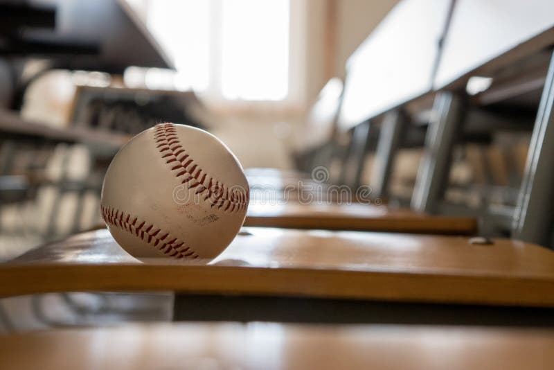 Baseball on a Classroom Bench Stock Image - Image of dugout, game ...