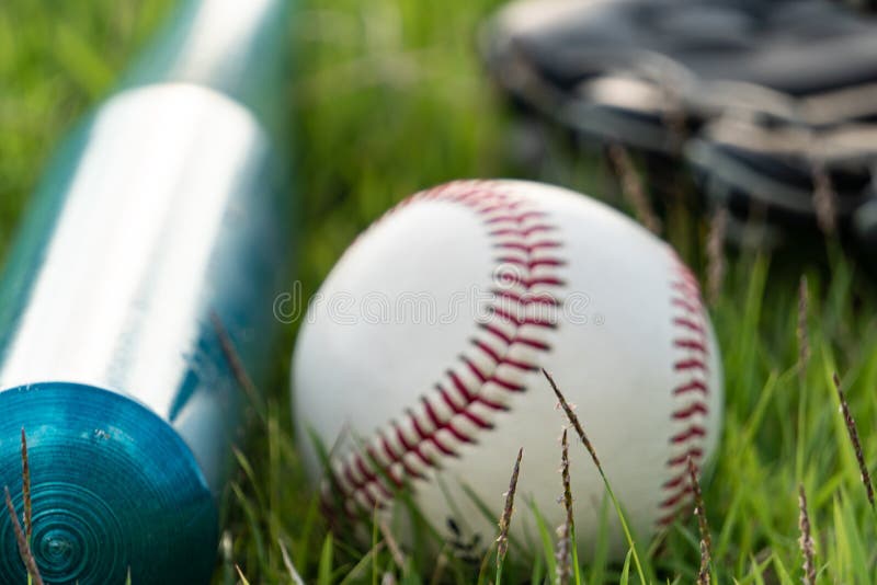 Baseball Equipment on the Lawn Stock Photo - Image of hitting, base ...