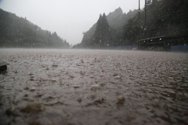 Baseball field in the rain stock photo. Image of linear - 208207624