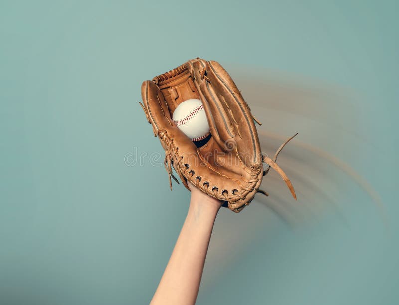 A Baseball Glove on His Hand Catches a White Game Ball Stock Image ...