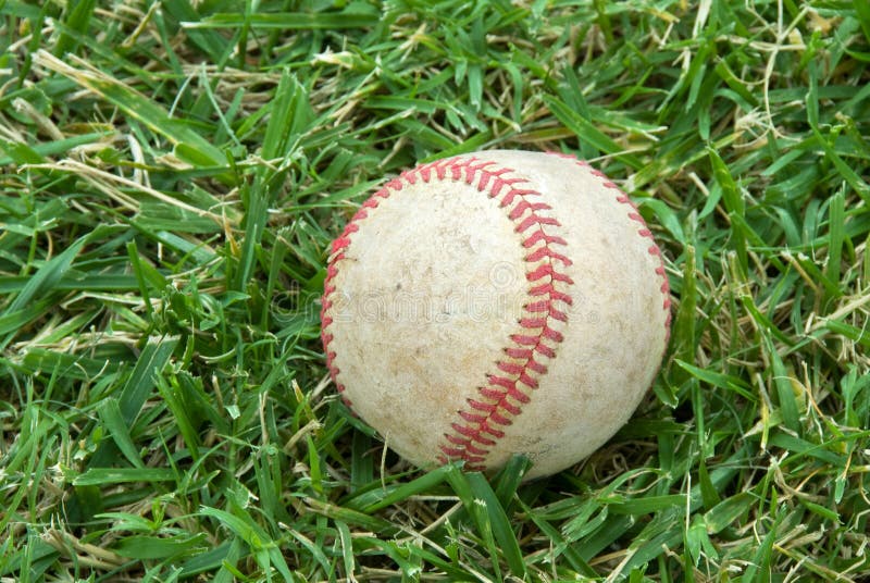 Baseball on grass field stock image. Image of sports, worn - 5931893