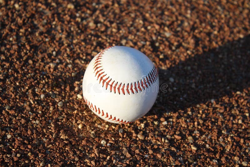 Baseball on ground stock image. Image of ball, white - 23132137