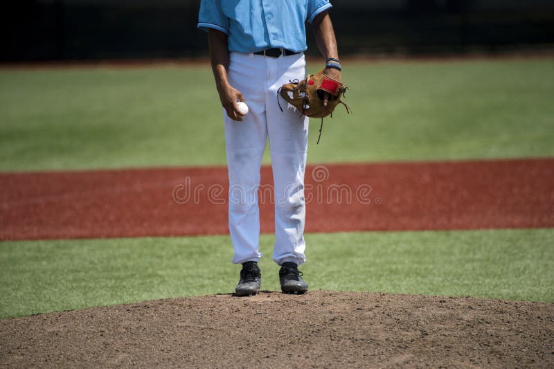 Baseball Pitcher Ready To Pitch in an Evening Baseball Game Stock Photo ...