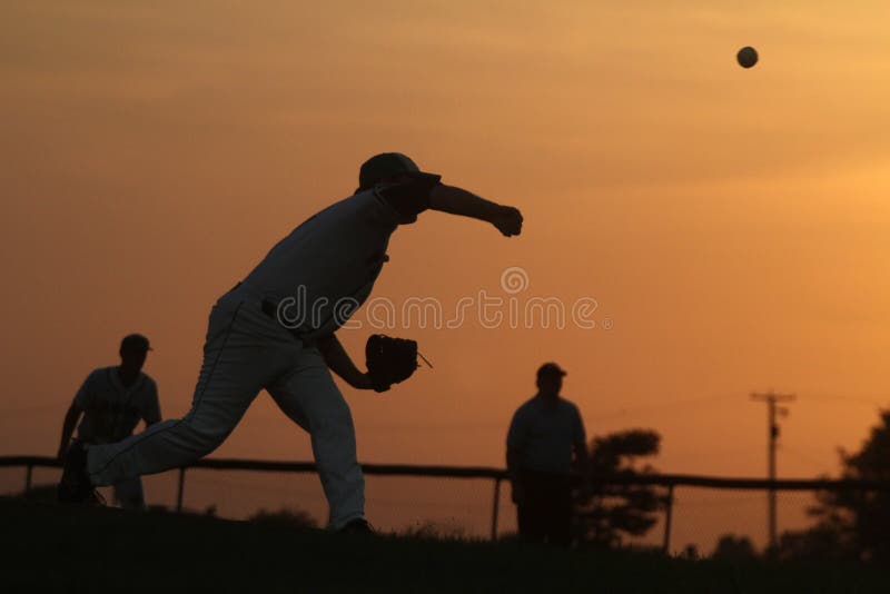 Baseball pitcher at sunset editorial photo. Image of americana - 151812776