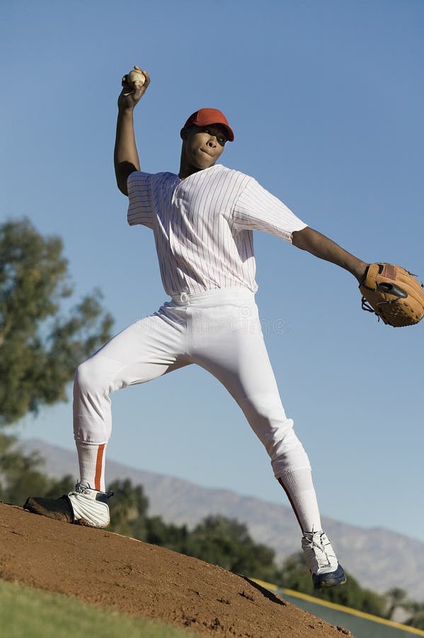 Baseball Pitcher Throwing Ball during Game Stock Photo - Image of ...