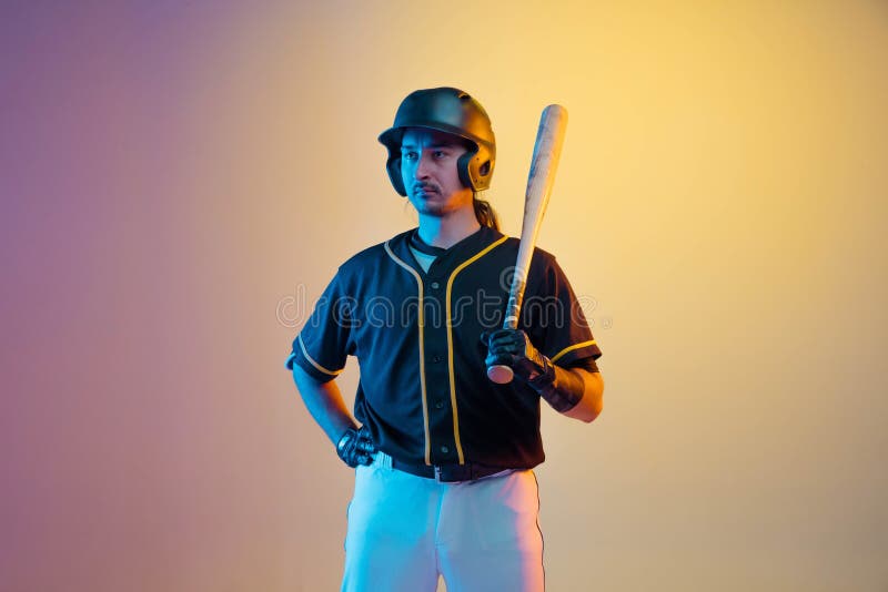 Baseball Player, Pitcher in a Black Uniform Practicing on Gradient ...
