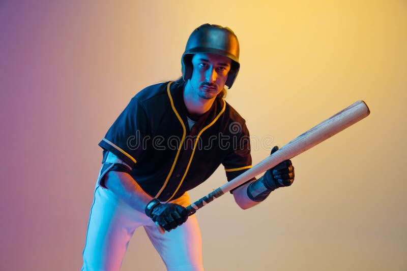Baseball Player, Pitcher in a Black Uniform Practicing on Gradient ...