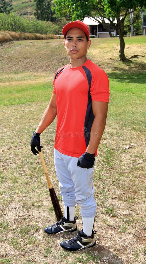 Baseball Player Poses with His Bat Stock Photo - Image of cleats ...