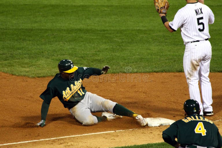Baseball - safe at third! editorial image. Image of green - 11072680