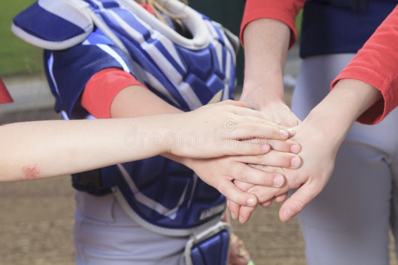 Baseball Team Puting Hand Together Stock Image - Image of outdoors ...