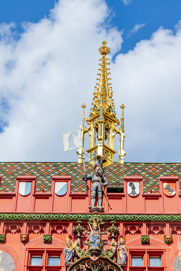 Basel Old Rathouse- Red Building with a Blue Sky in the Background ...