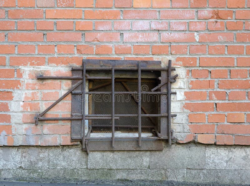 Basement Window with a Metal Barrier Stock Photo - Image of wall ...