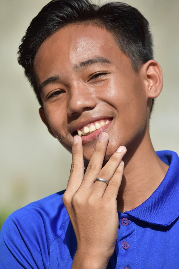 A Bashful Asian Boy stock photo. Image of youth, males - 140618938