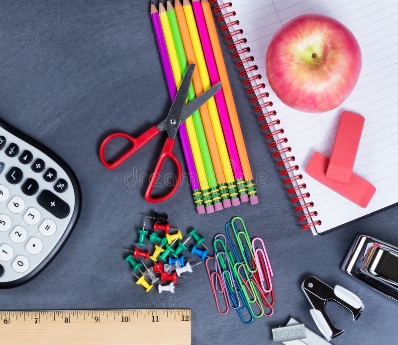 Basic School Supplies with Apple on White Wooden Desk Stock Photo ...