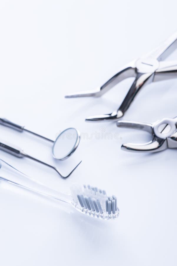 Basic Dental Tools on White Table Stock Photo - Image of dentistry ...