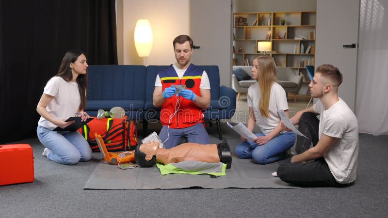 Basic Emergency Training in Group, Man Showing Artificial Lung ...