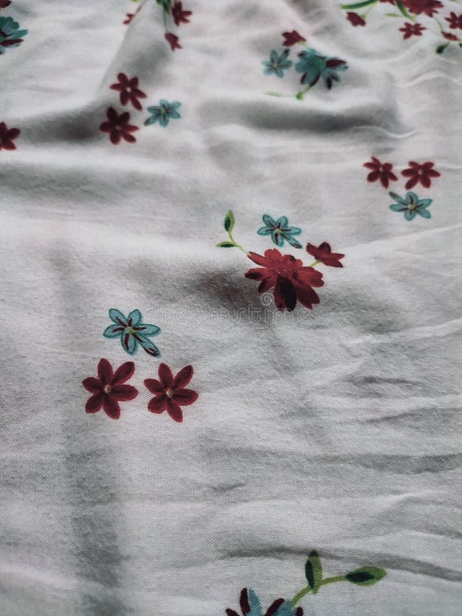 The Basic Fabric is White with Red and Blue Floral Motifs and Leaves ...