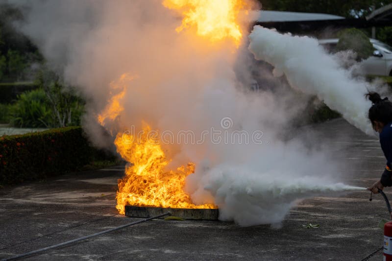 Basic Fire Fighting and Practice of the Emergency. Stock Photo - Image ...