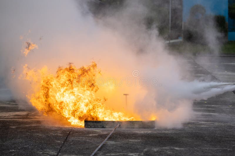 Basic Fire Fighting and Practice of the Emergency. Stock Photo - Image ...