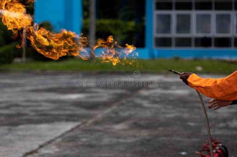 Basic Fire Fighting and Practice of the Emergency. Stock Photo - Image ...