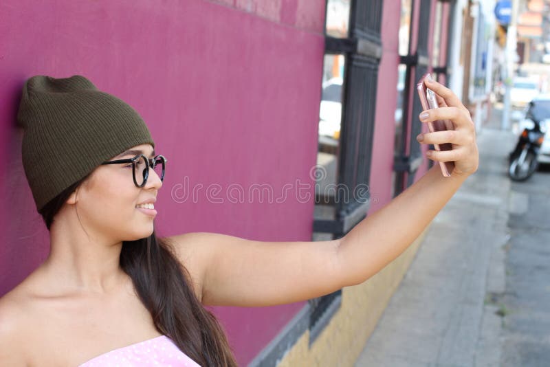 Basic girl taking a selfie stock photo. Image of blank - 130765754