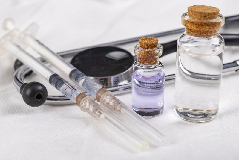 Basic Medical Kit Prepared for Vaccinations. Protective Clothing and ...