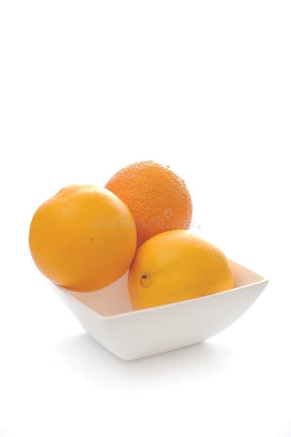 Three Sunkist Oranges on a White Background - Jeruk Sunkist Stock Photo ...