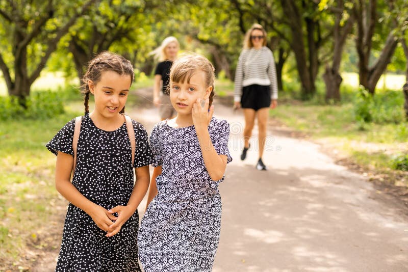 Basic School Students Crossing the Road Stock Photo - Image of book ...