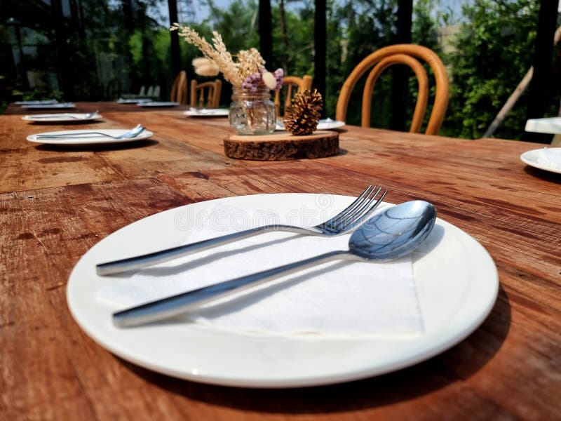 Basic Table Settings with Equipped Utensils Stock Photo - Image of ...