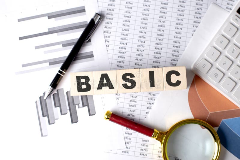 BASIC Text on Wooden Block on Graph Background with Pen and Magnifier ...