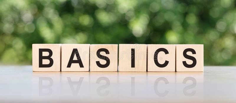 Basics Word Written on Wooden Blocks. the Text is Written in Black ...