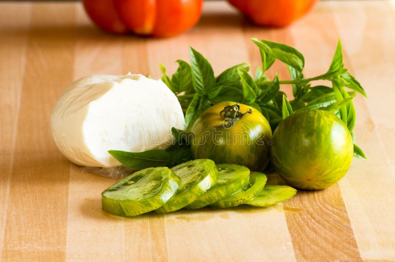 Basil cheese and tomatoes stock photo. Image of mediterranean - 26662680