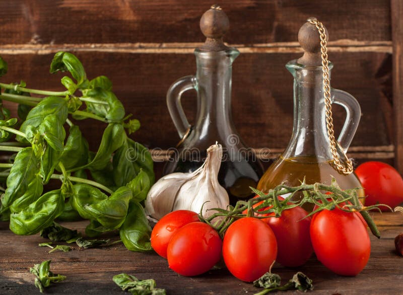 Basil, garlic and tomatoes stock photo. Image of fresh - 29416806