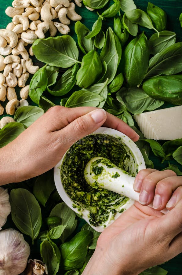 Basil pesto make stock image. Image of bowl, fresh, nuts - 75474801