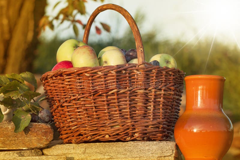 Basket of Apple with Ceramic Pitcher Stock Image - Image of light ...