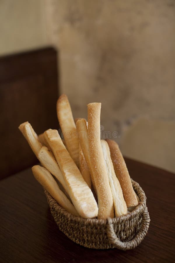 Basket of bread sticks stock image. Image of basket, color - 23708515